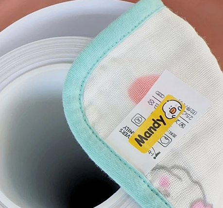 Why are washable labels essential for organizing clothes?